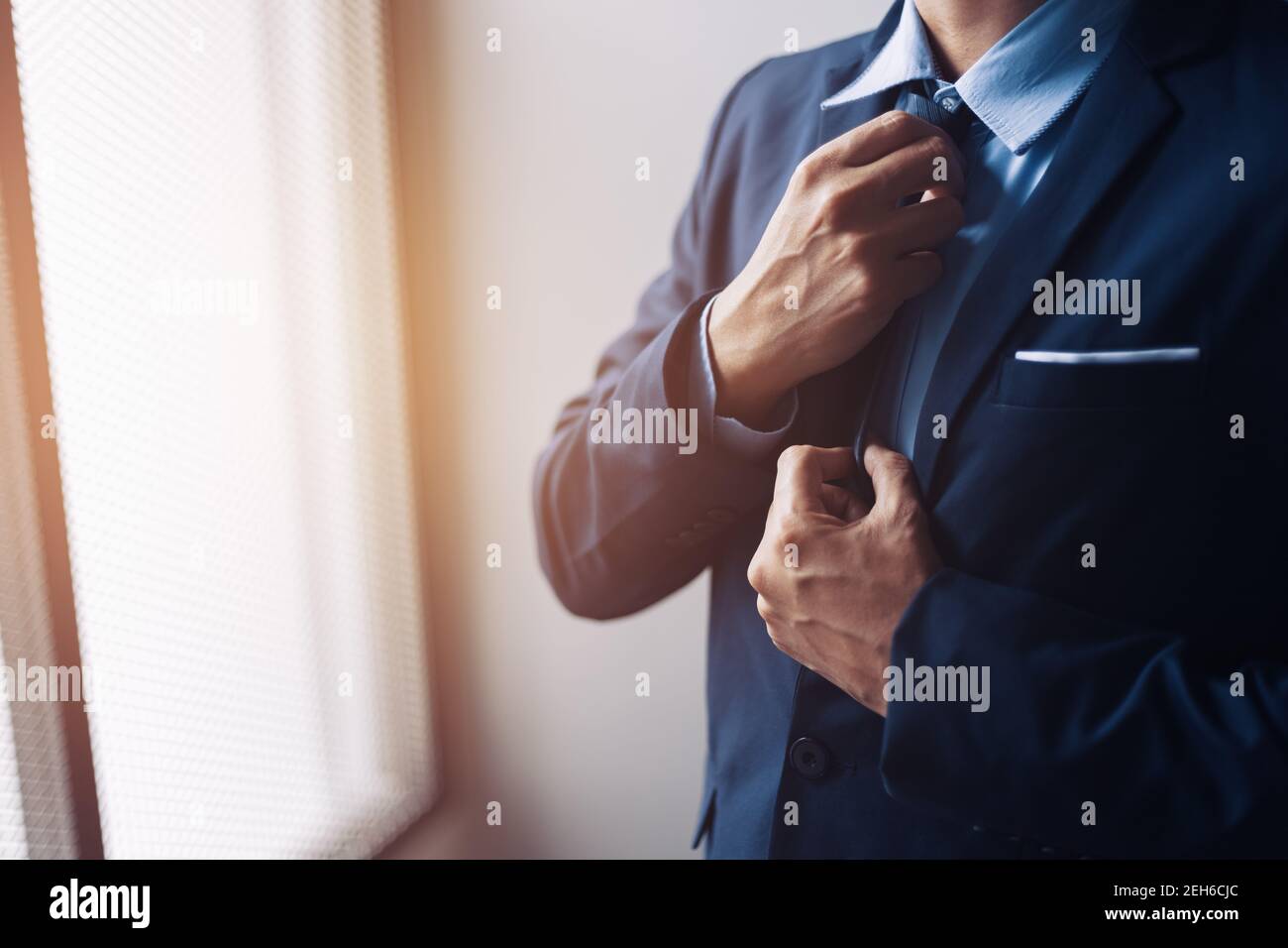 Man adjusting sleeve hi-res stock photography and images - Alamy