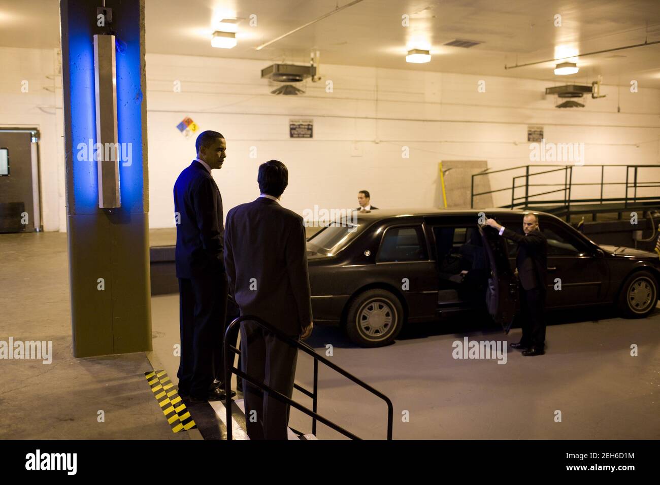 President Barack Obama talks with friend Mike Ramos before departing ...