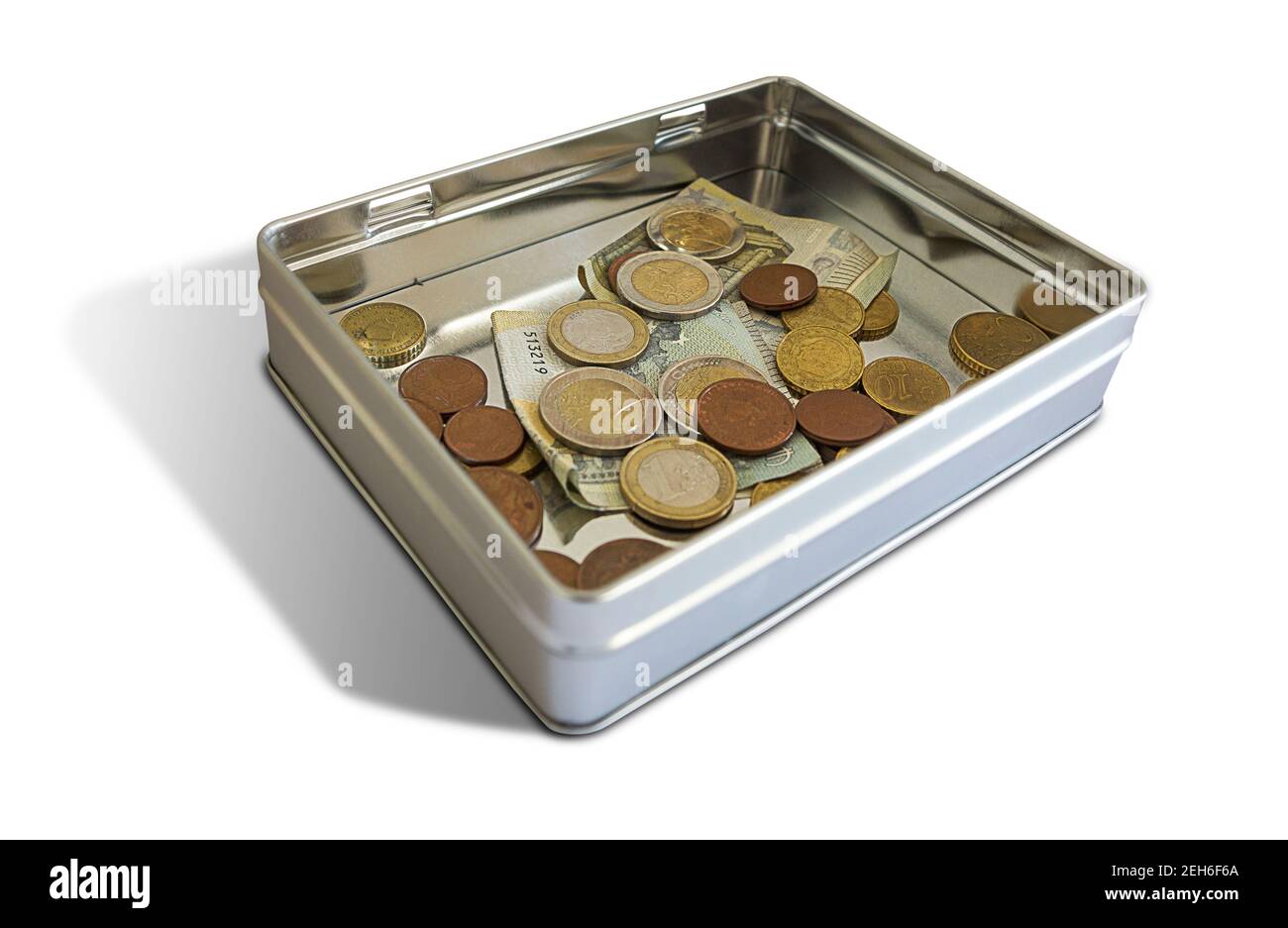 Spare euro coins on a tin case isolated on white background Stock Photo ...