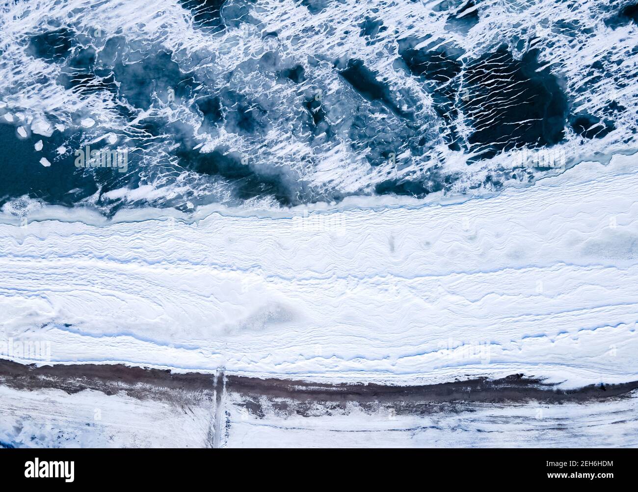 Aerial shot of the frozen seashore - perfect for background or ...