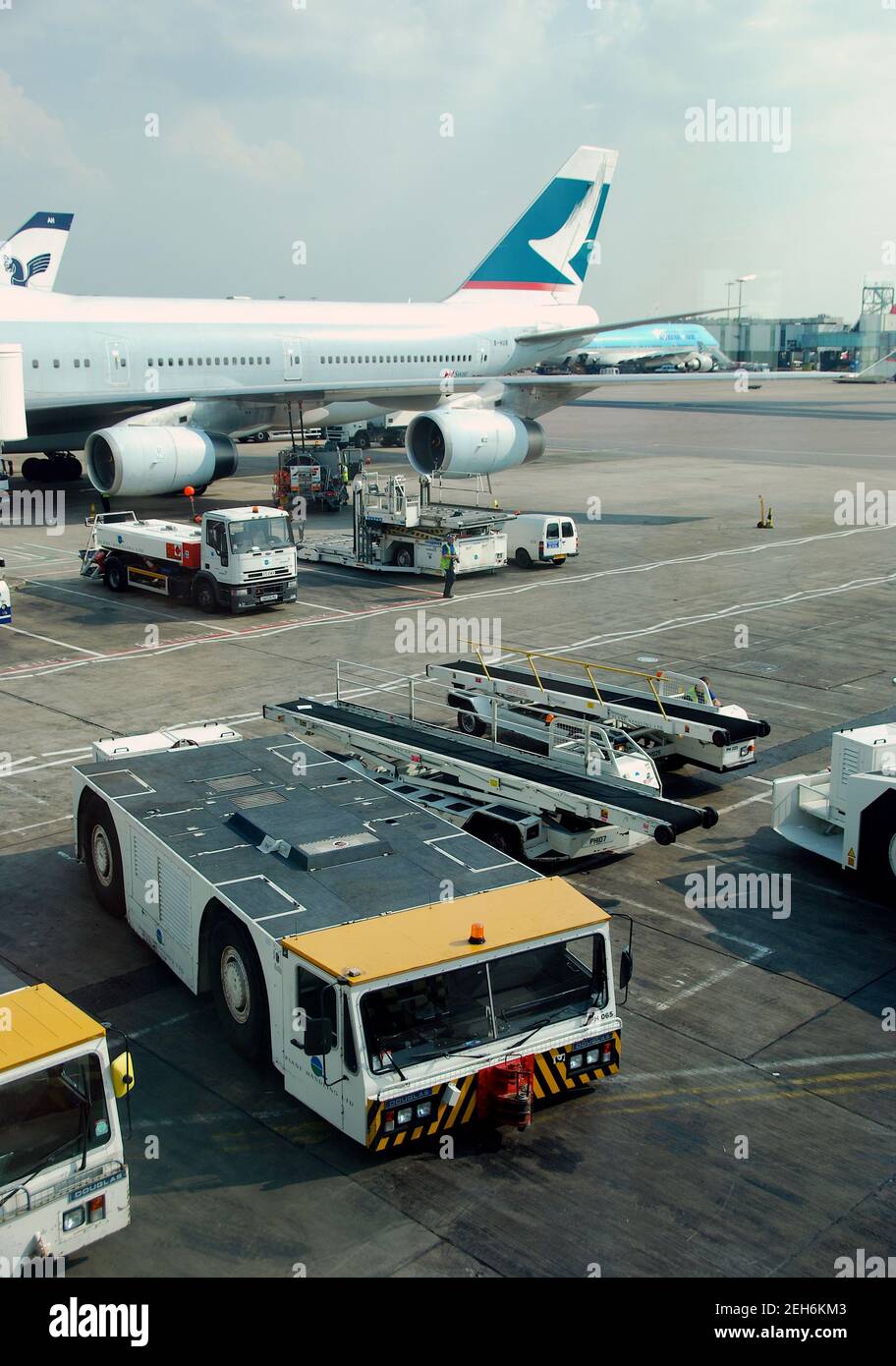 Loading equipment for aircraft at an Airport Stock Photo - Alamy