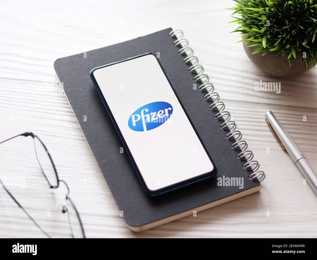 Assam, india - February 19, 2021 : Pfizer logo on phone screen stock ...