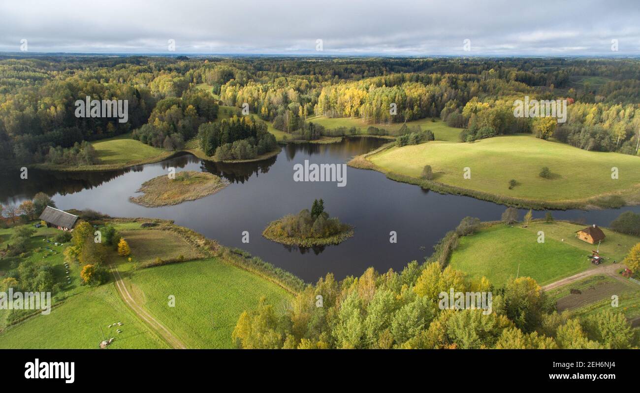 Aerial shot of beautiful Karula National Park full of lakes in Estonia ...