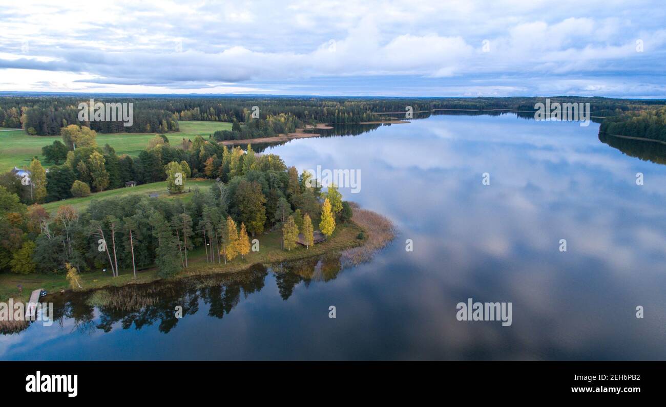 Aerial shot of beautiful Karula National Park full of lakes in Estonia ...