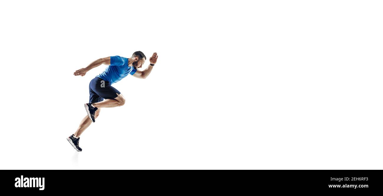 Flying. Caucasian professional male athlete, runner training isolated ...