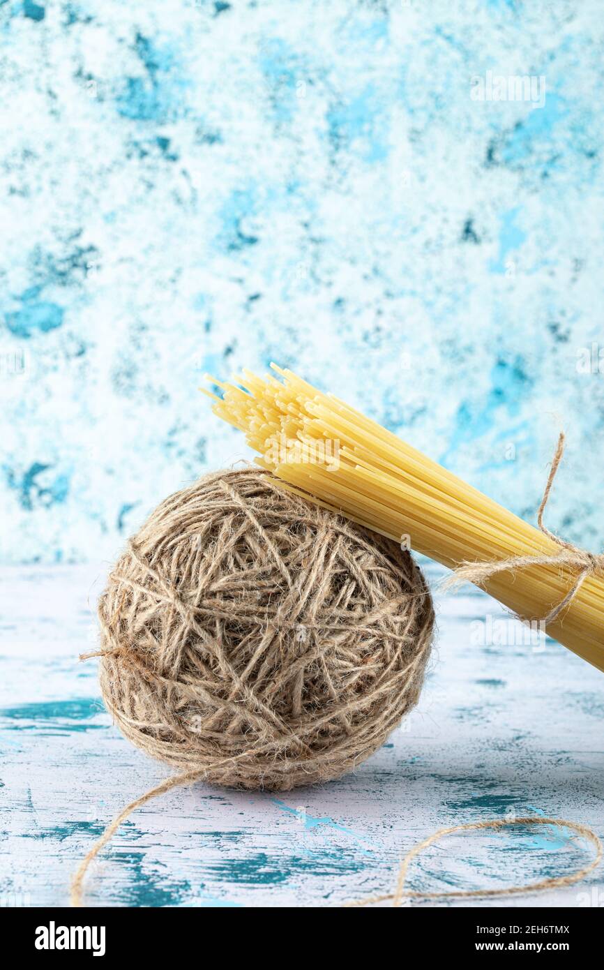 Italian pasta spaghetti tied rope hi-res stock photography and images ...