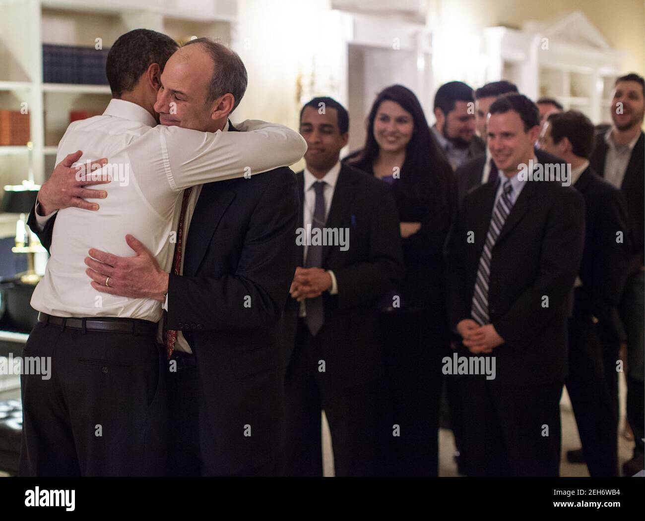 President Barack Obama hugs Phil Schiliro, assistant to the President ...