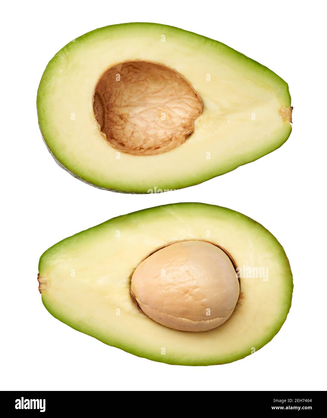 Halved avocado with seed isolated on a white background with clipping ...