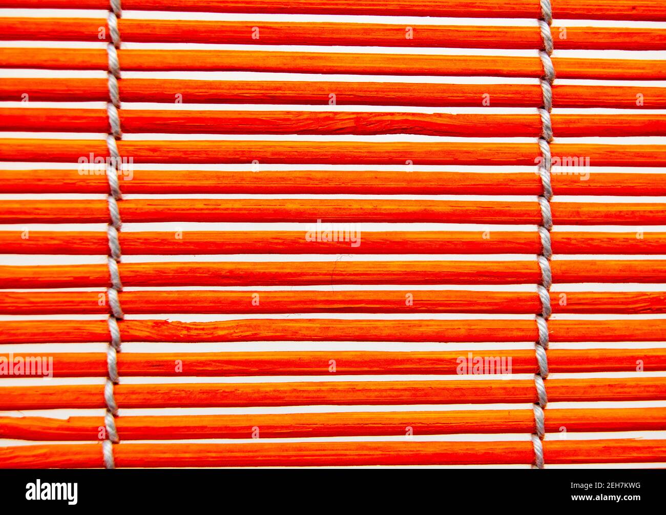 Orange bamboo mat texture background. Close up Stock Photo - Alamy