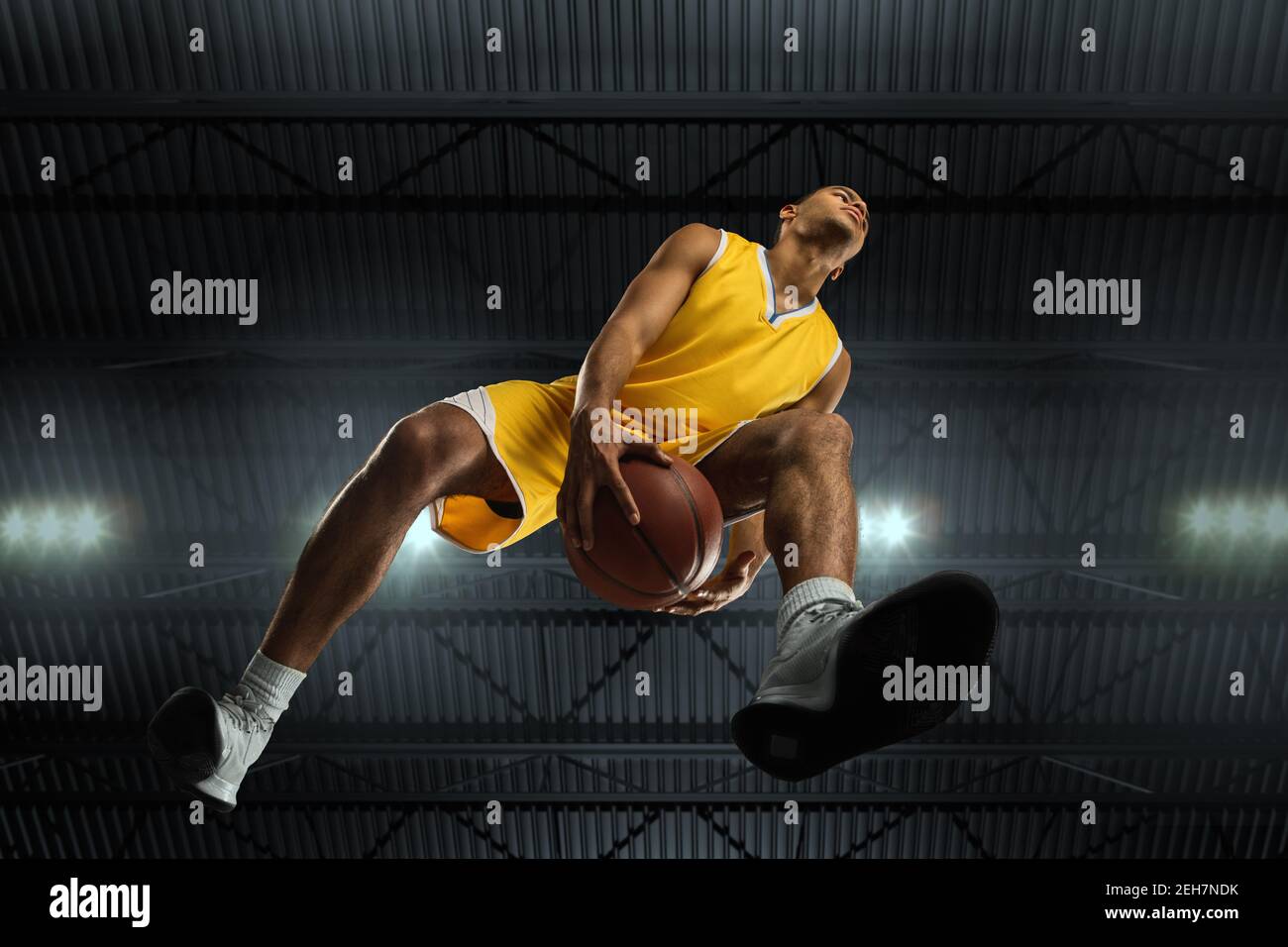 Young professional basketball player in action, motion isolated on ...