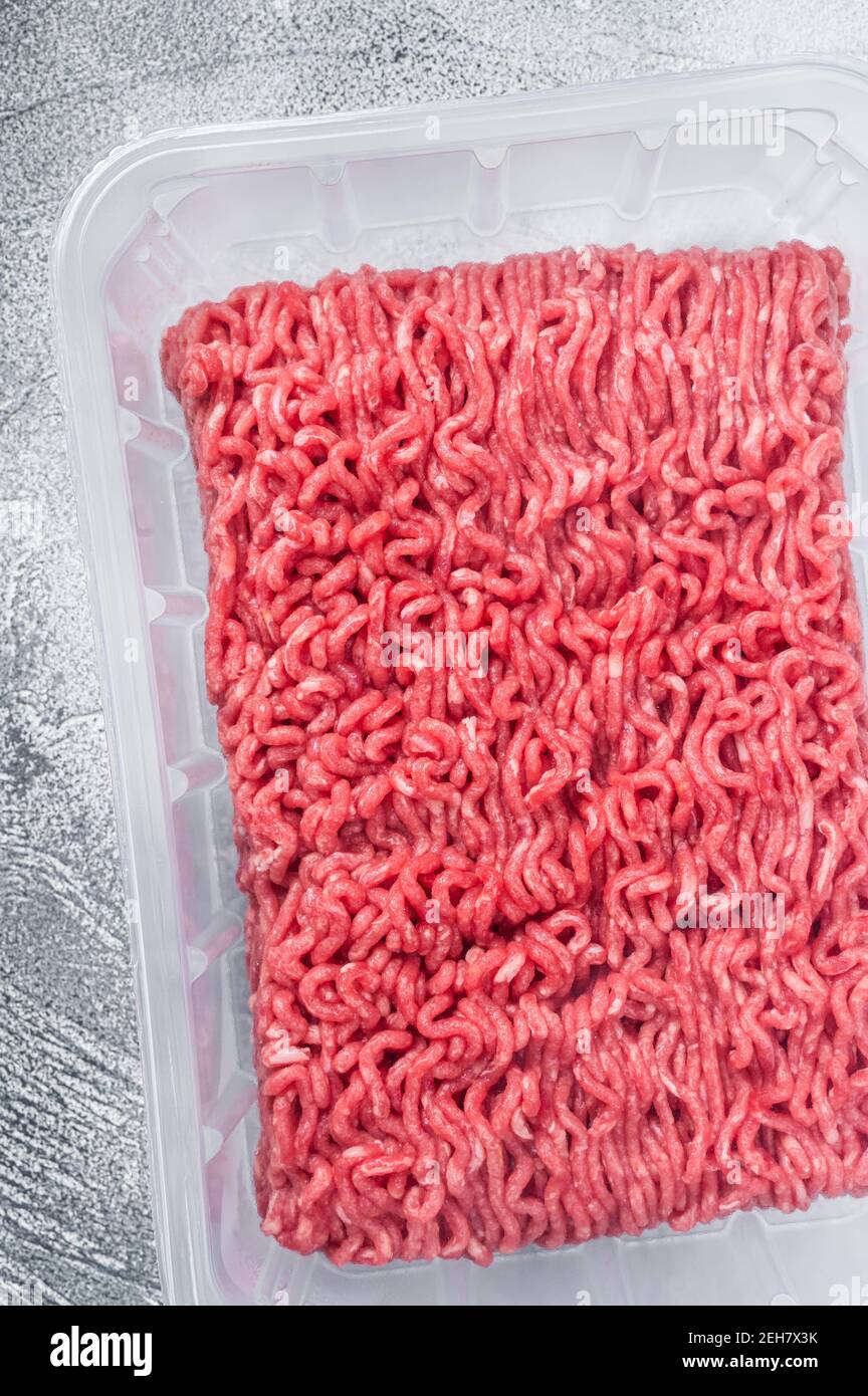 Raw ground beef and pork meat in vacuum packaging from super market ...