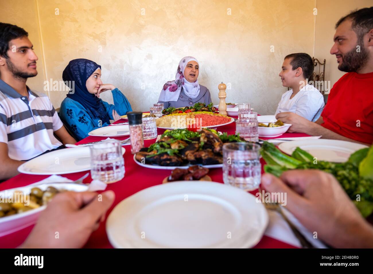 Happy Muslim Family Eating