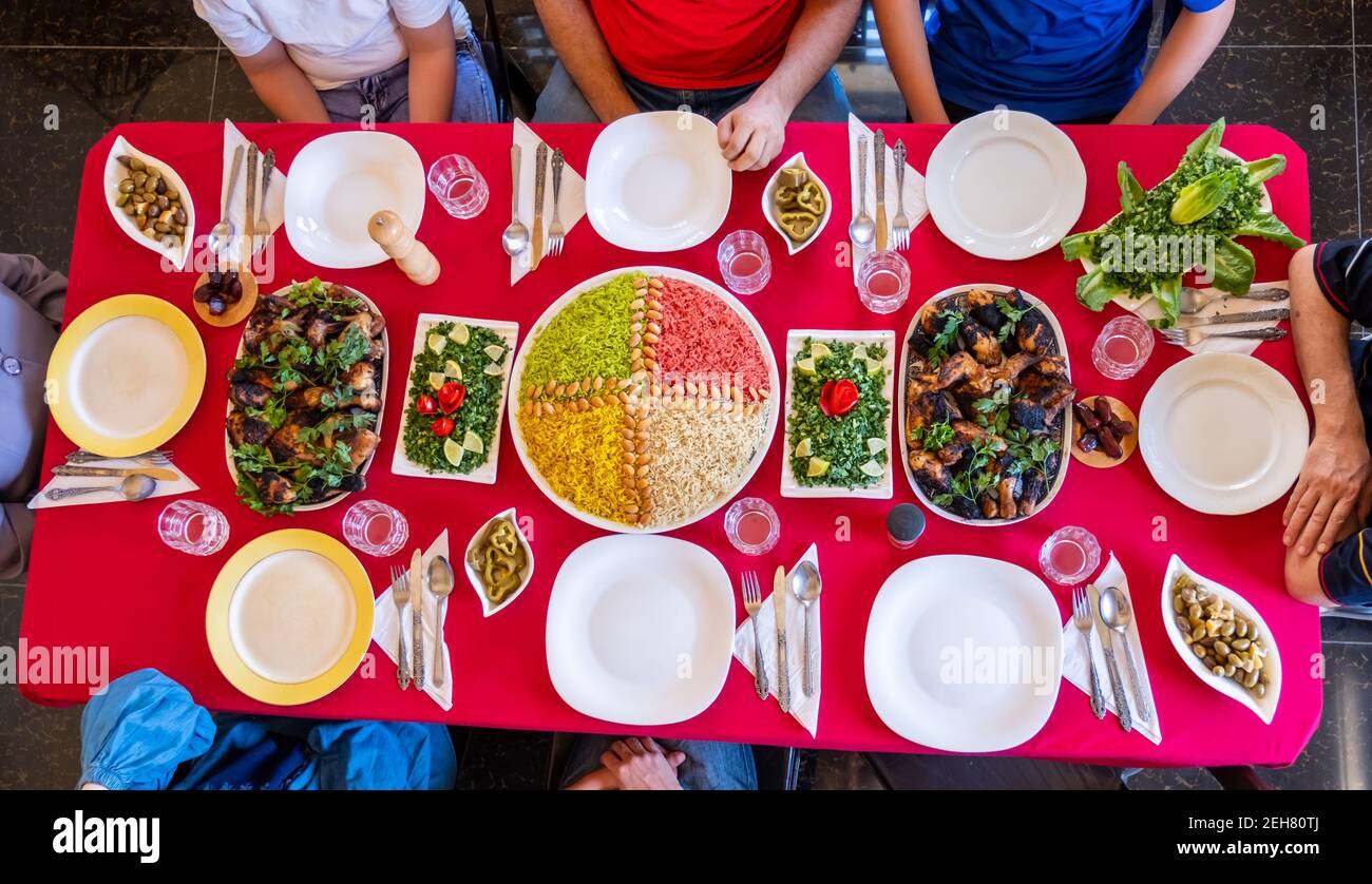 Ramadan iftar family happy authentic hi-res stock photography and ...