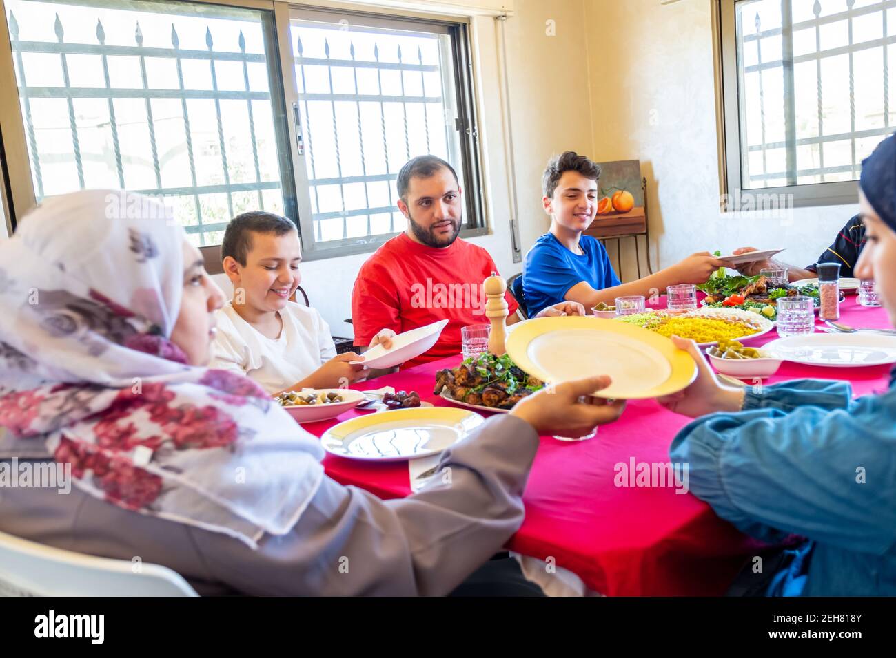 Muslim family dinner hi-res stock photography and images - Alamy