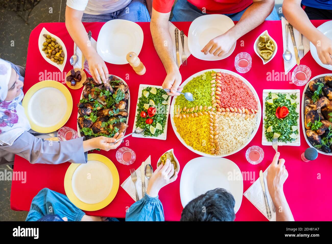 Arabic muslim family eating together Stock Photo - Alamy