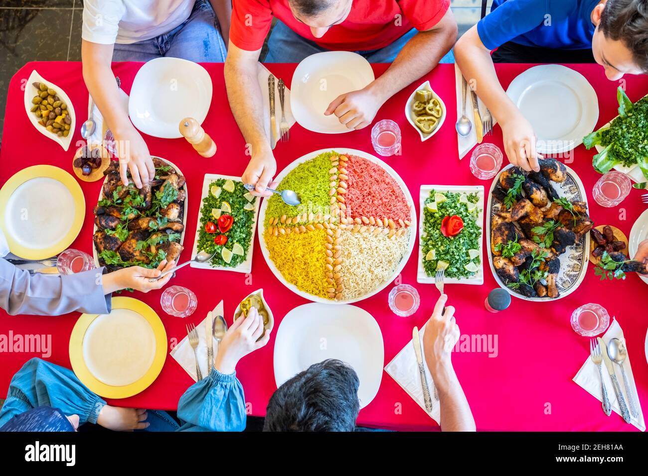 Arabic muslim family eating together Stock Photo - Alamy