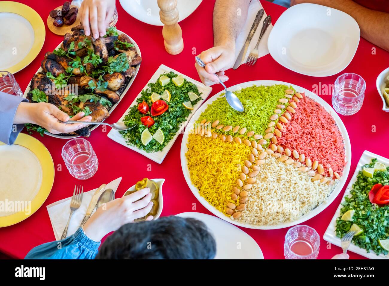 Arabic muslim family eating together Stock Photo - Alamy