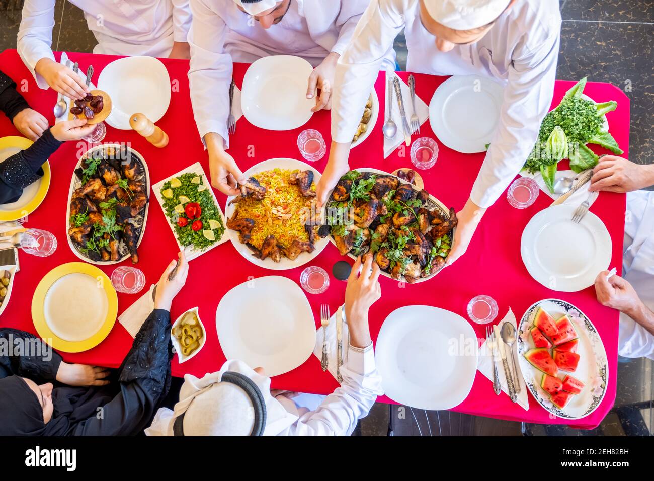 Arabic muslim family eating together Stock Photo - Alamy