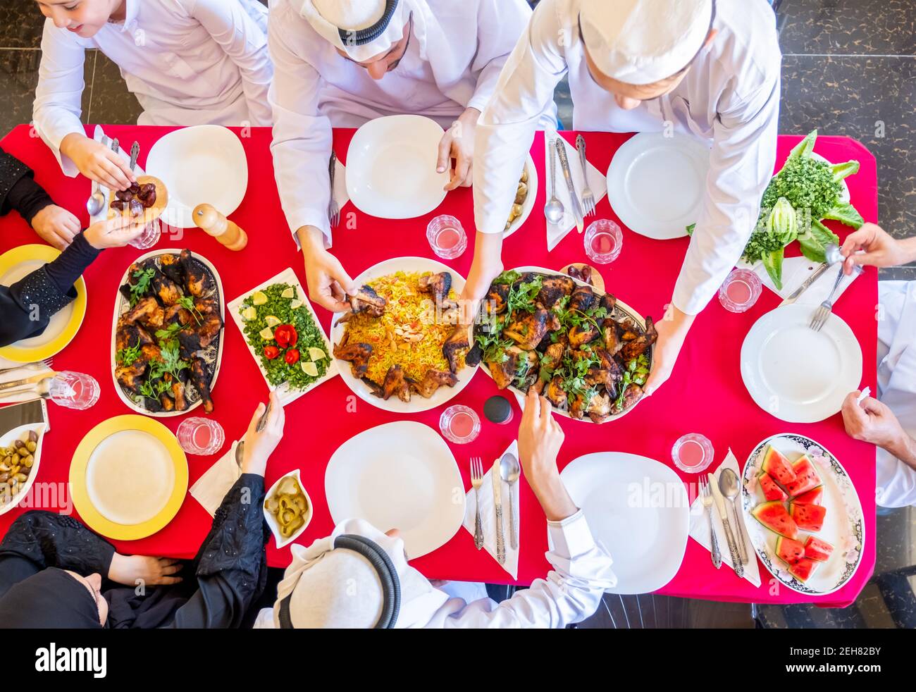 Arabic muslim family eating together Stock Photo - Alamy