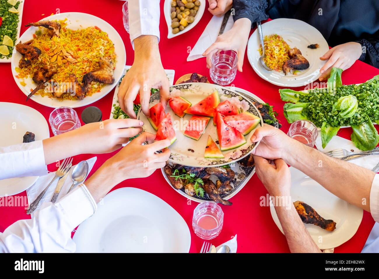 Arabic muslim family eating together Stock Photo - Alamy