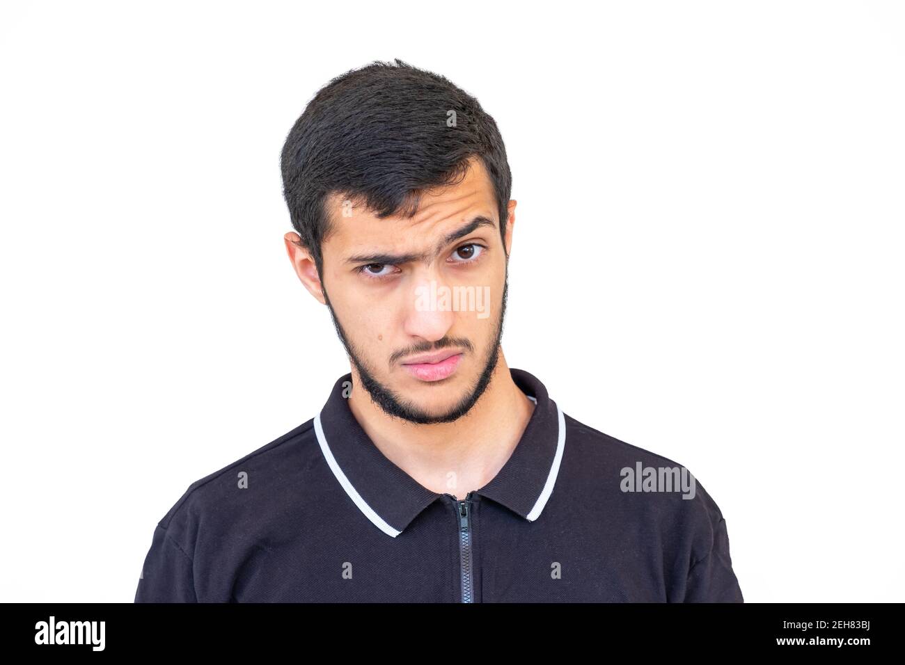 Arabic guy raising one of his eyebrows and smiling with an evil look ... Arabic guy raising one of his eyebrows and smiling with an evil look ...