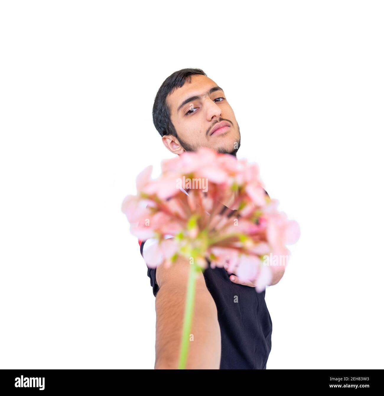 Arabic boy holding flower in his hand Stock Photo - Alamy