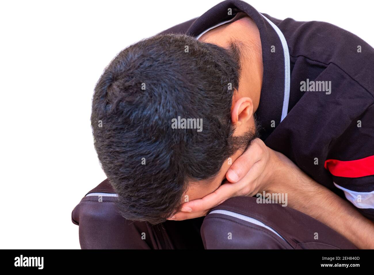 Arabic boy feeling upset and sad Stock Photo - Alamy