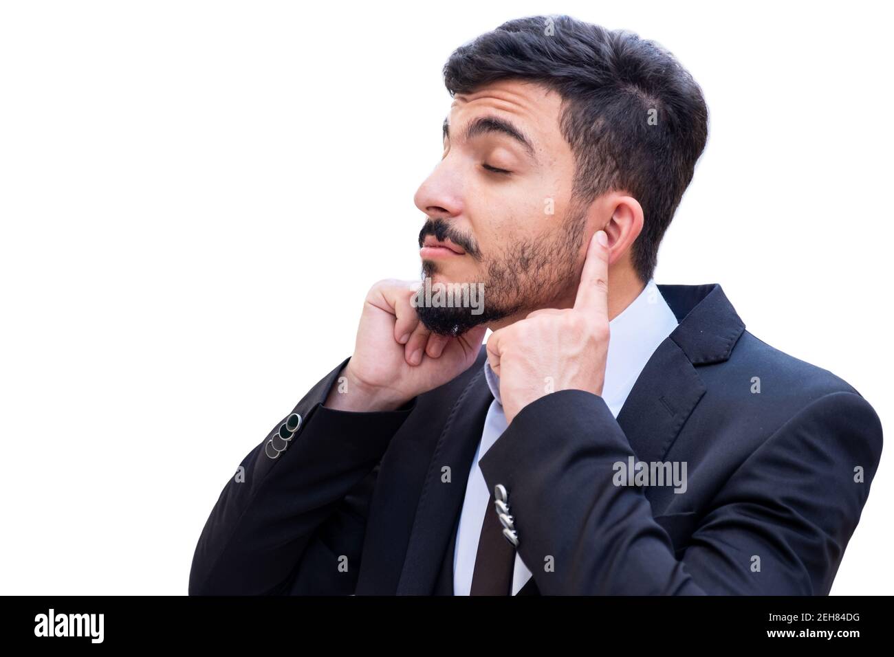 Arabian man blocking the sounds and whispers of the negative ideas from ...