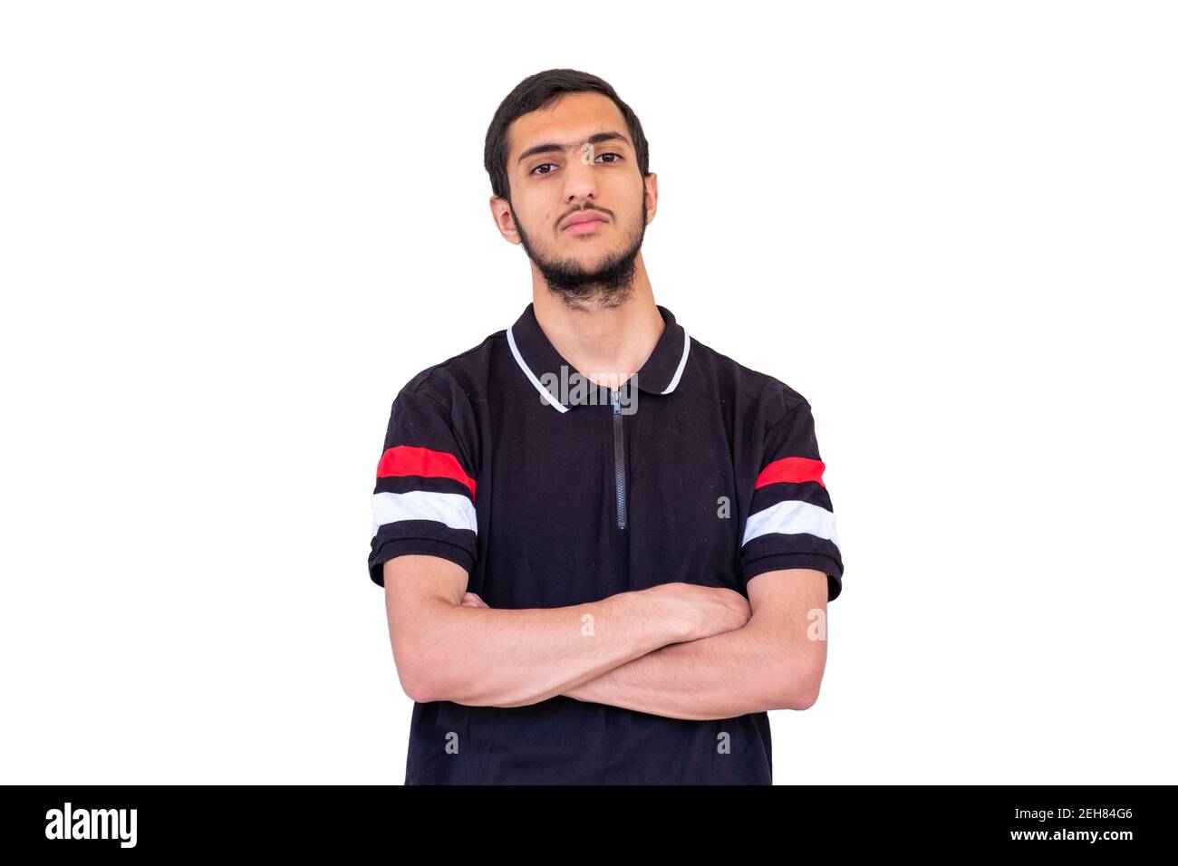 Arabic boy standing with serious look on his face Stock Photo - Alamy