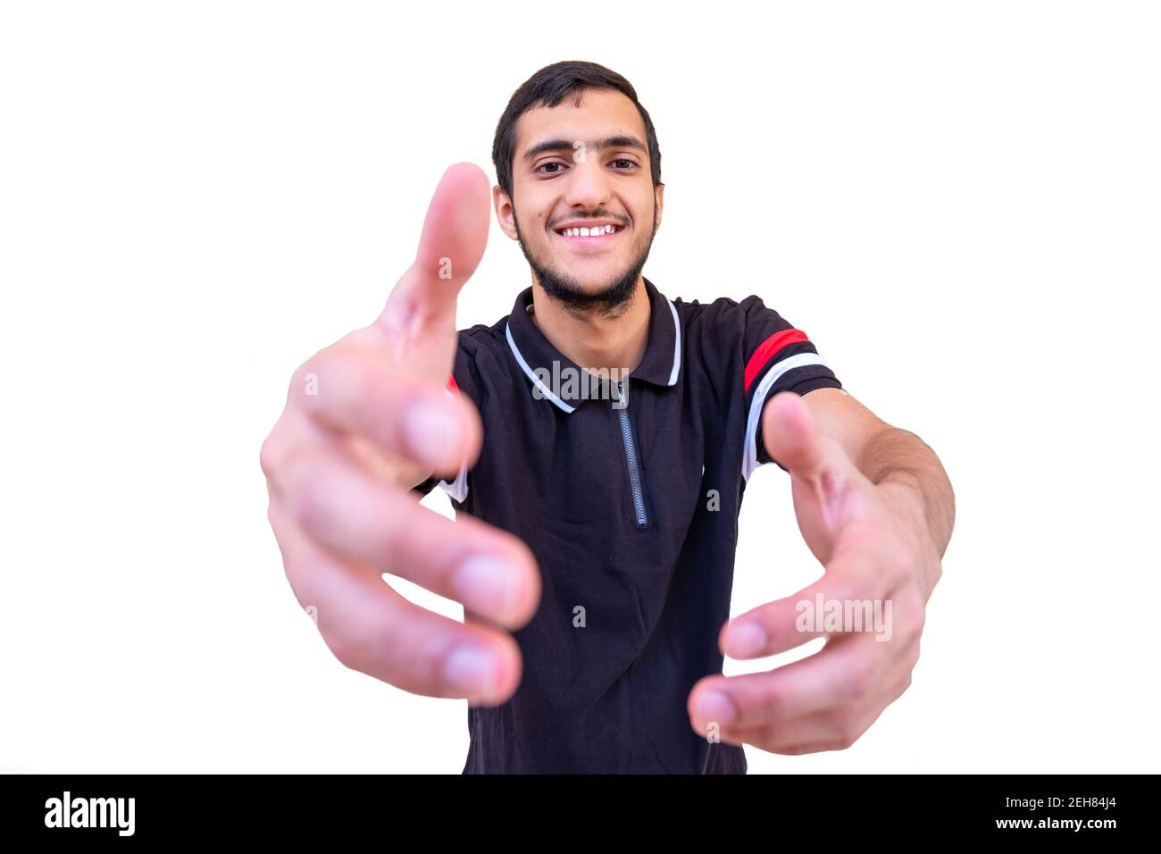 Happy Arabic Muslim guy smiling Stock Photo - Alamy