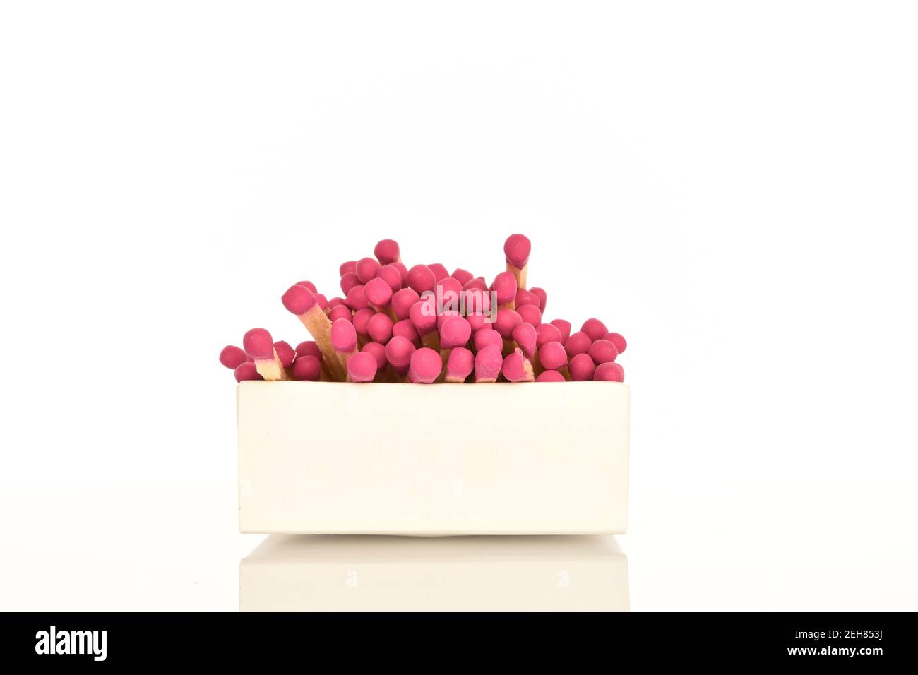 One paper box with wooden matches on a white background Stock Photo - Alamy