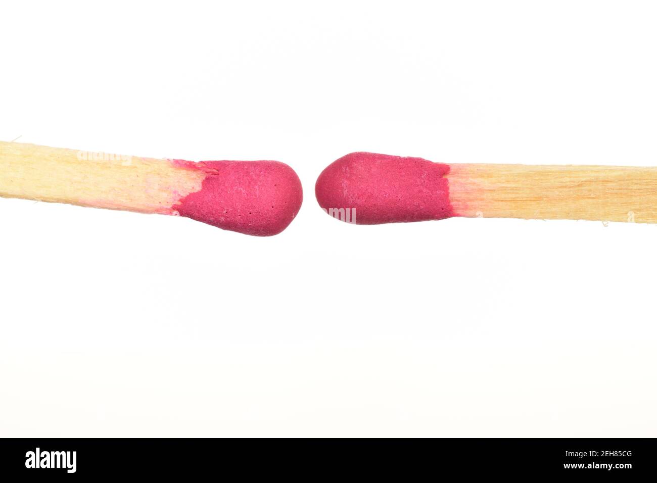 Two wooden matches, close-up, on a white background Stock Photo - Alamy