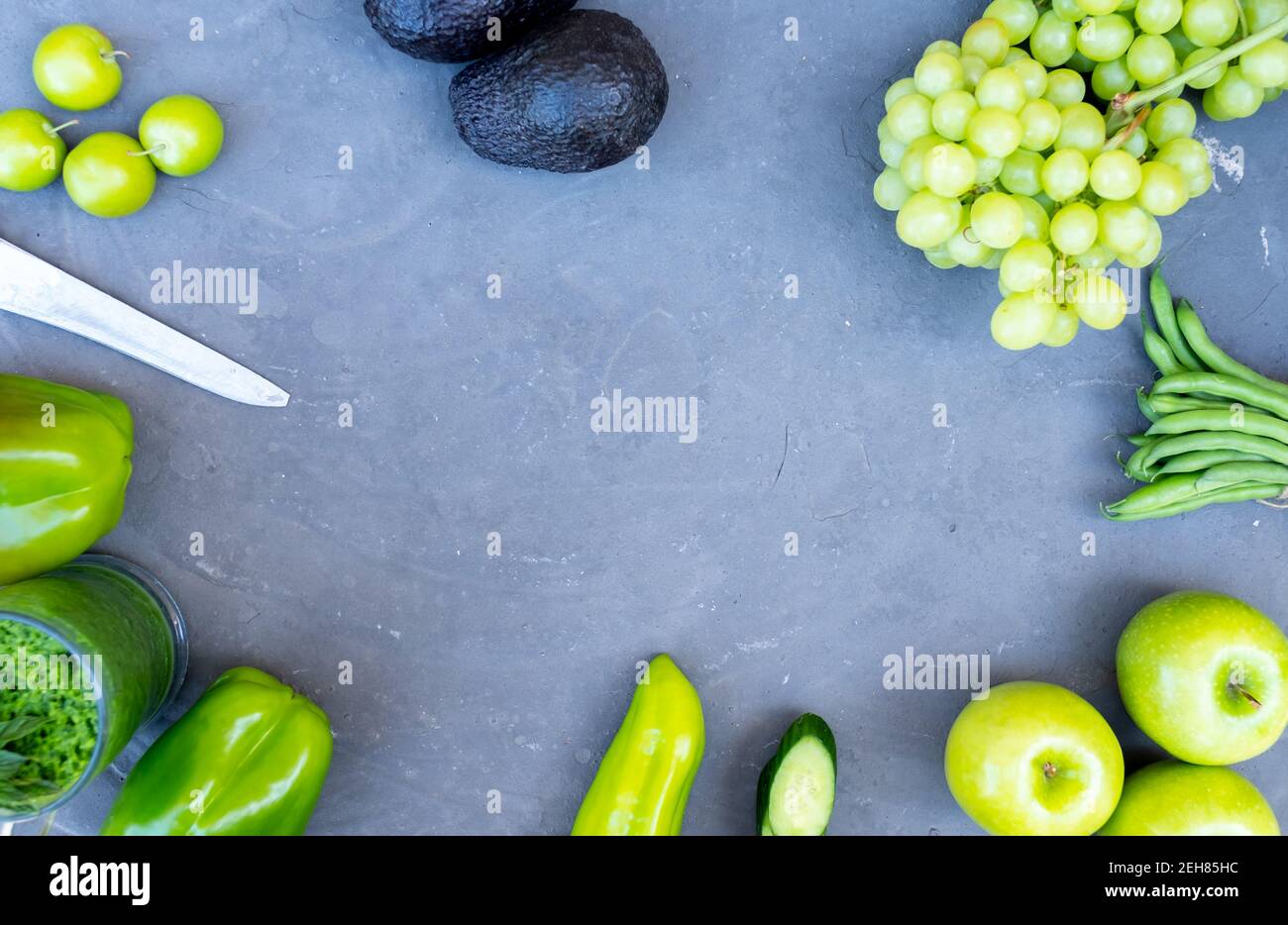 Fruits and vegetables on gray background forming a frame Stock Photo ...