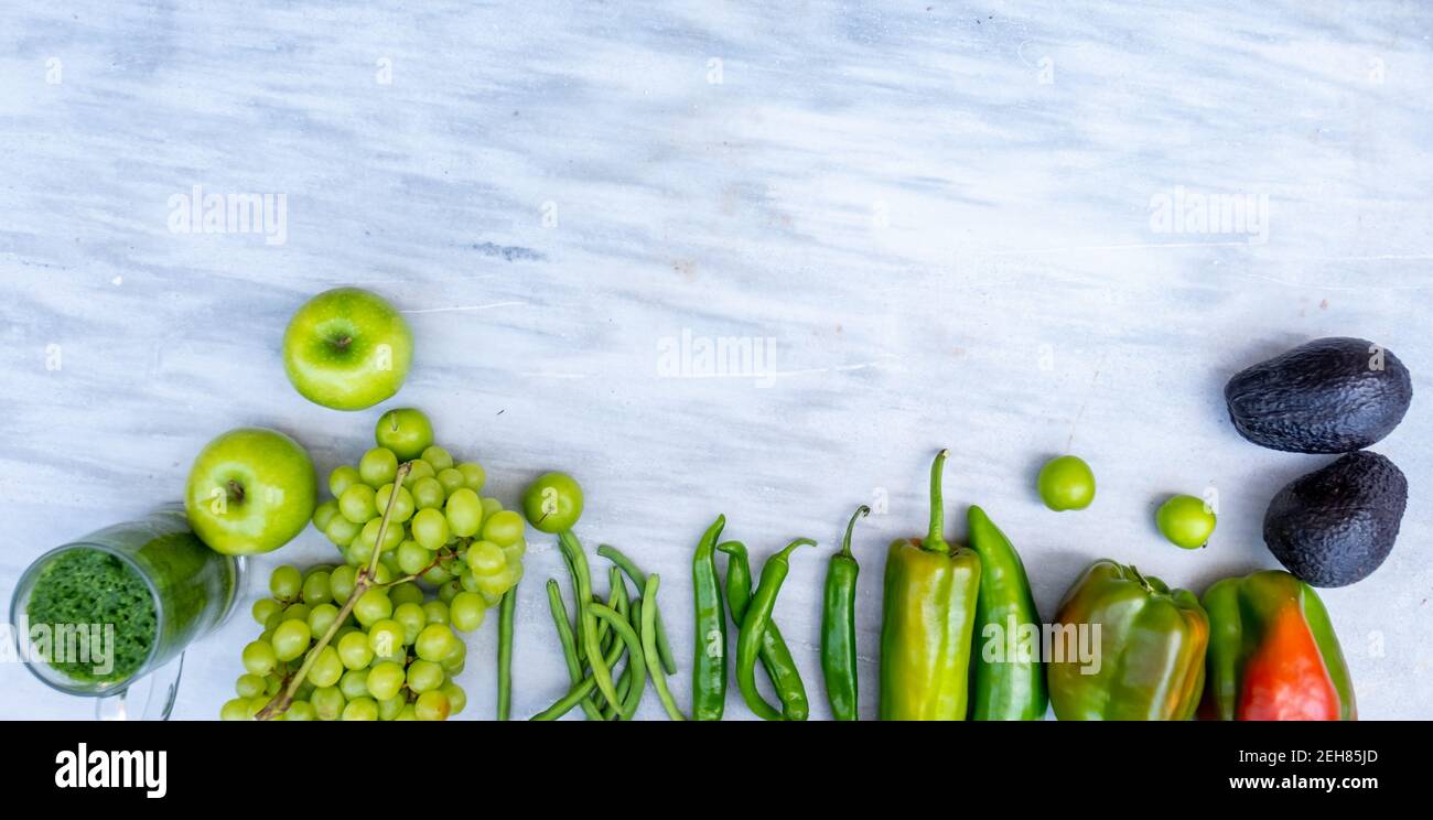 fruits and vegetables on a marbel board Stock Photo - Alamy