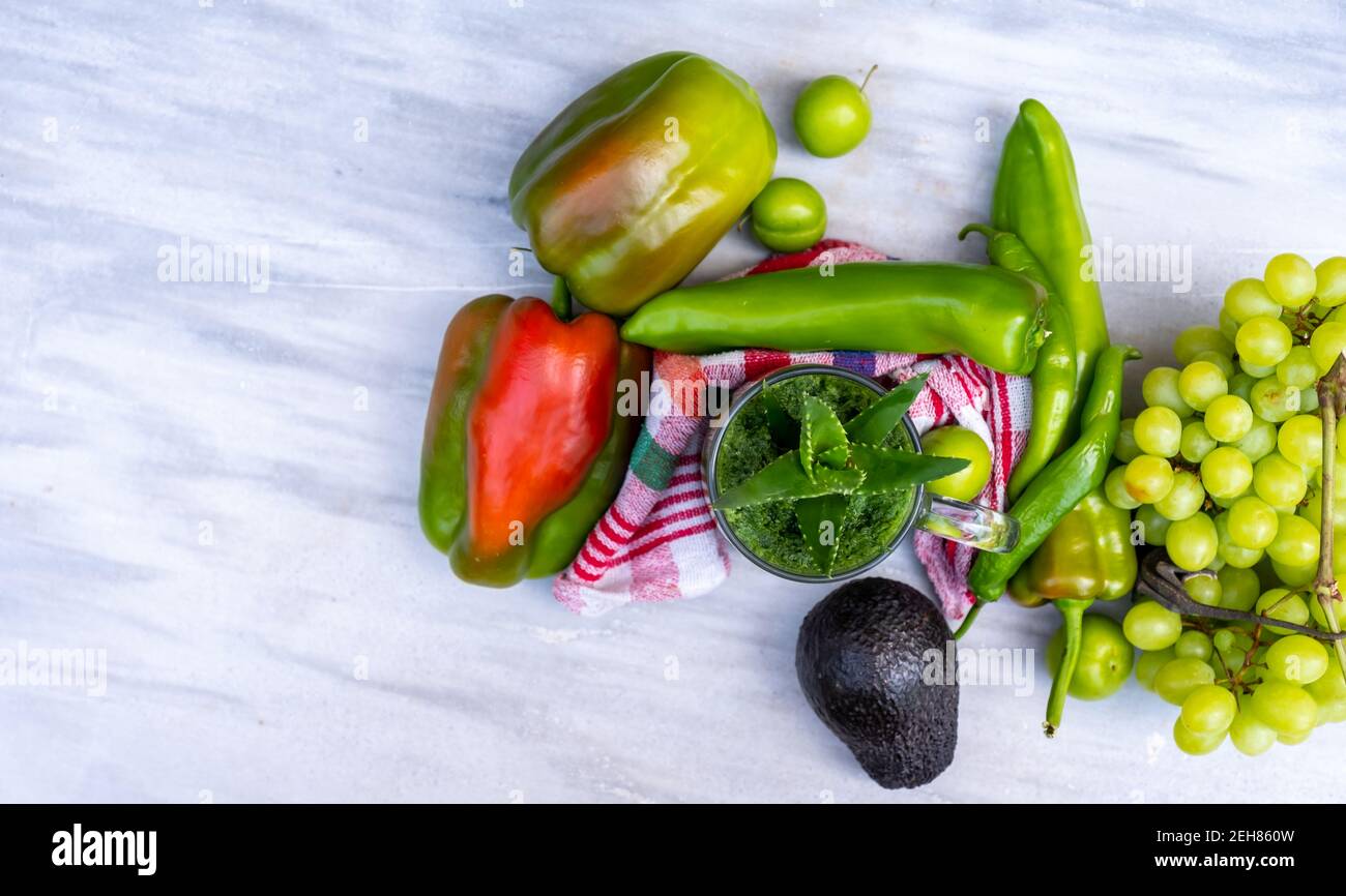 Bunch of fruits and vegetables on a marble board Stock Photo - Alamy