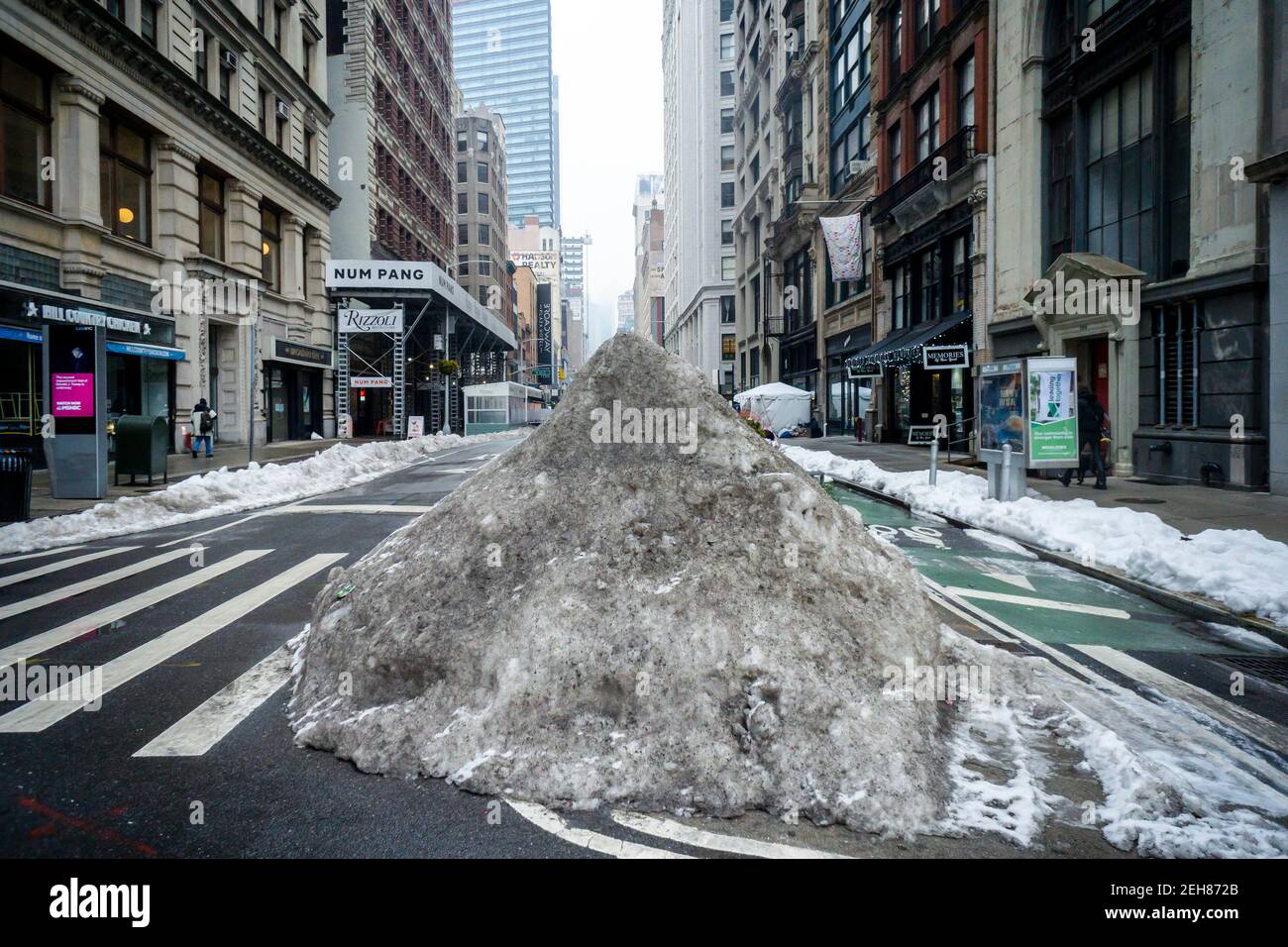 Mounds of dirty snow on the street in the Flatiron neighborhood in New ...