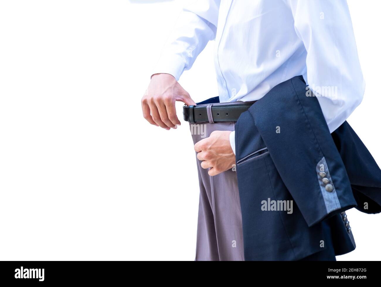 Guy stretching his pants showing how much weight he lost Stock Photo ...