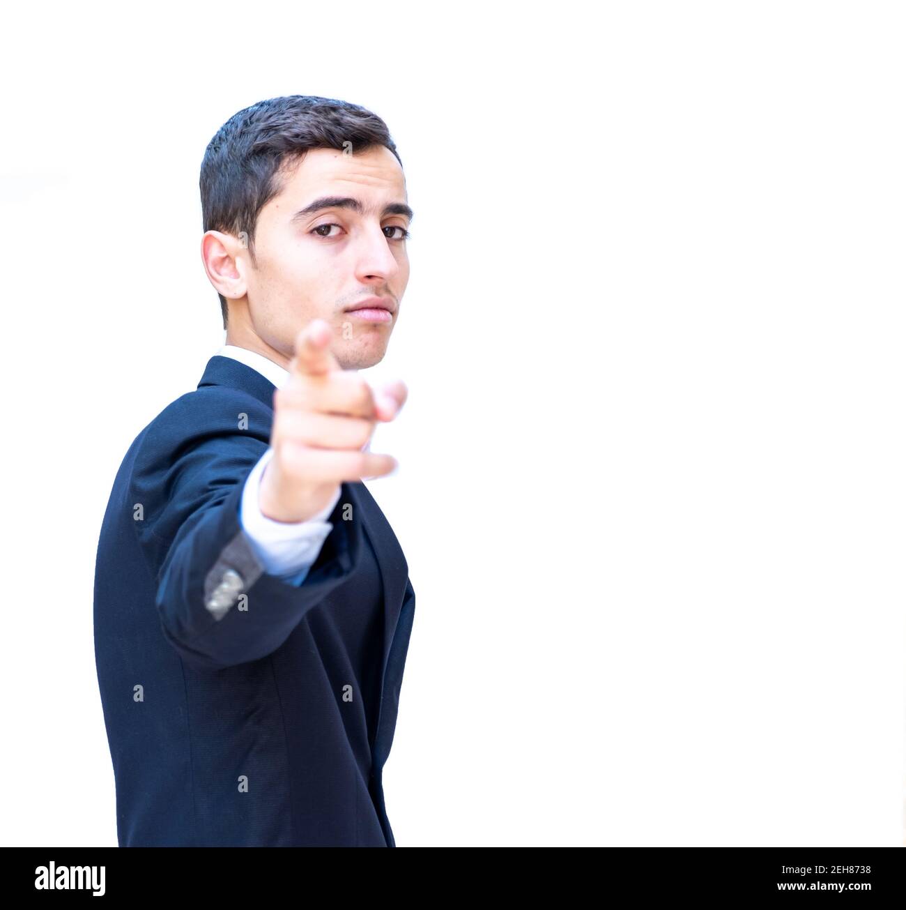 Arabic business man pointing at someone Stock Photo - Alamy