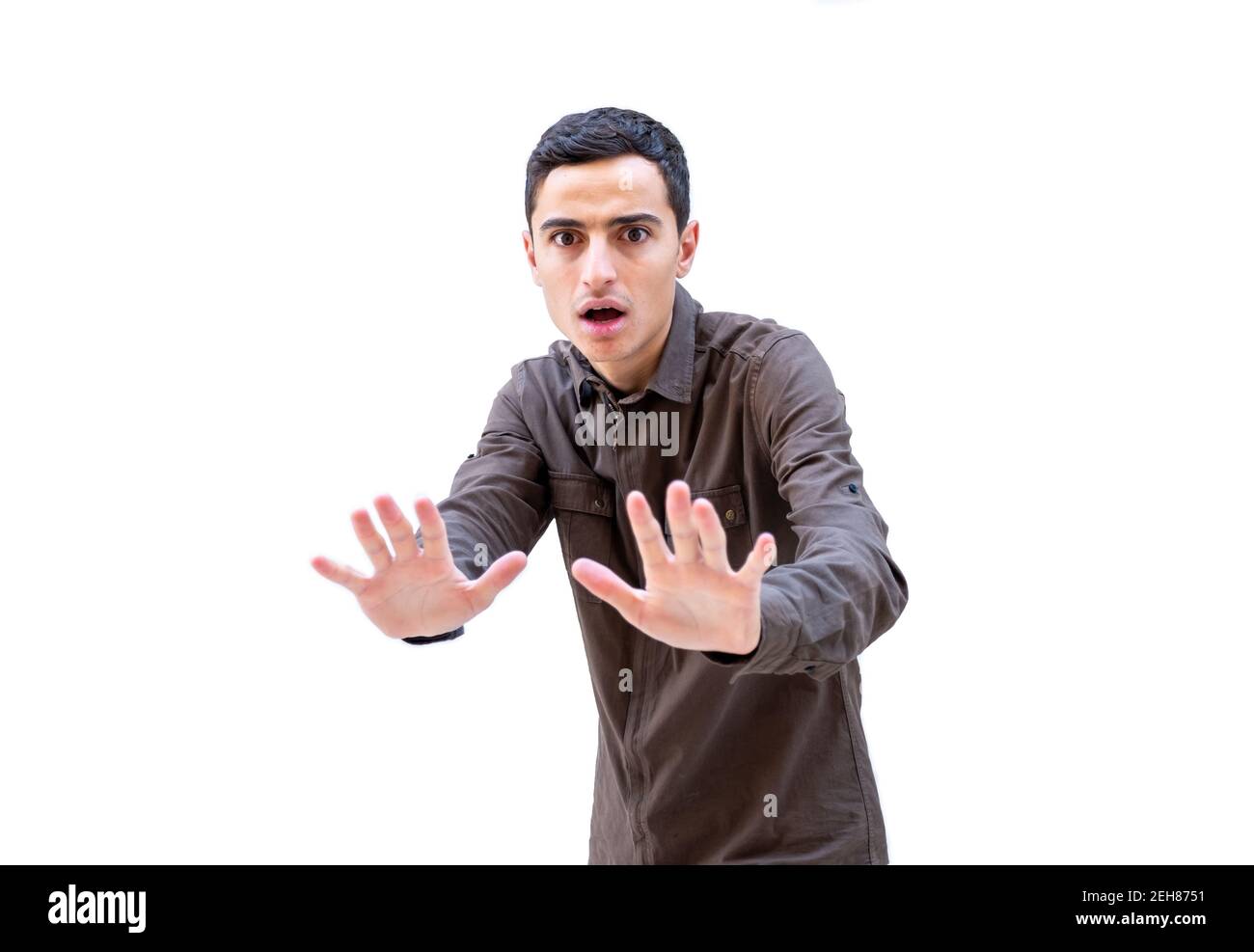 Arabic guy making warning symbol Stock Photo - Alamy