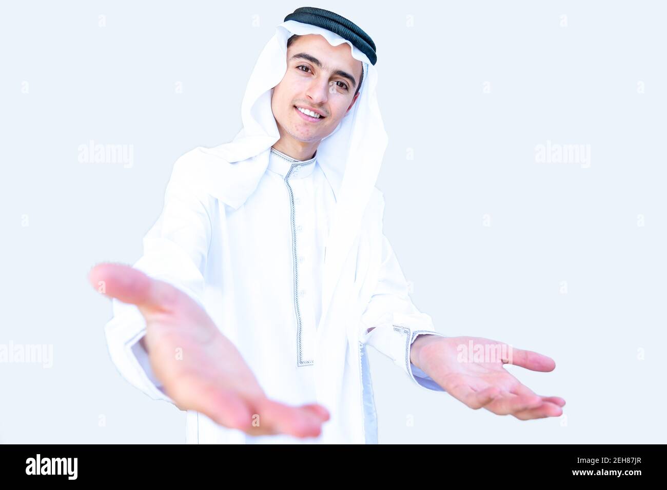 Arabic young man welcoming hi-res stock photography and images - Alamy