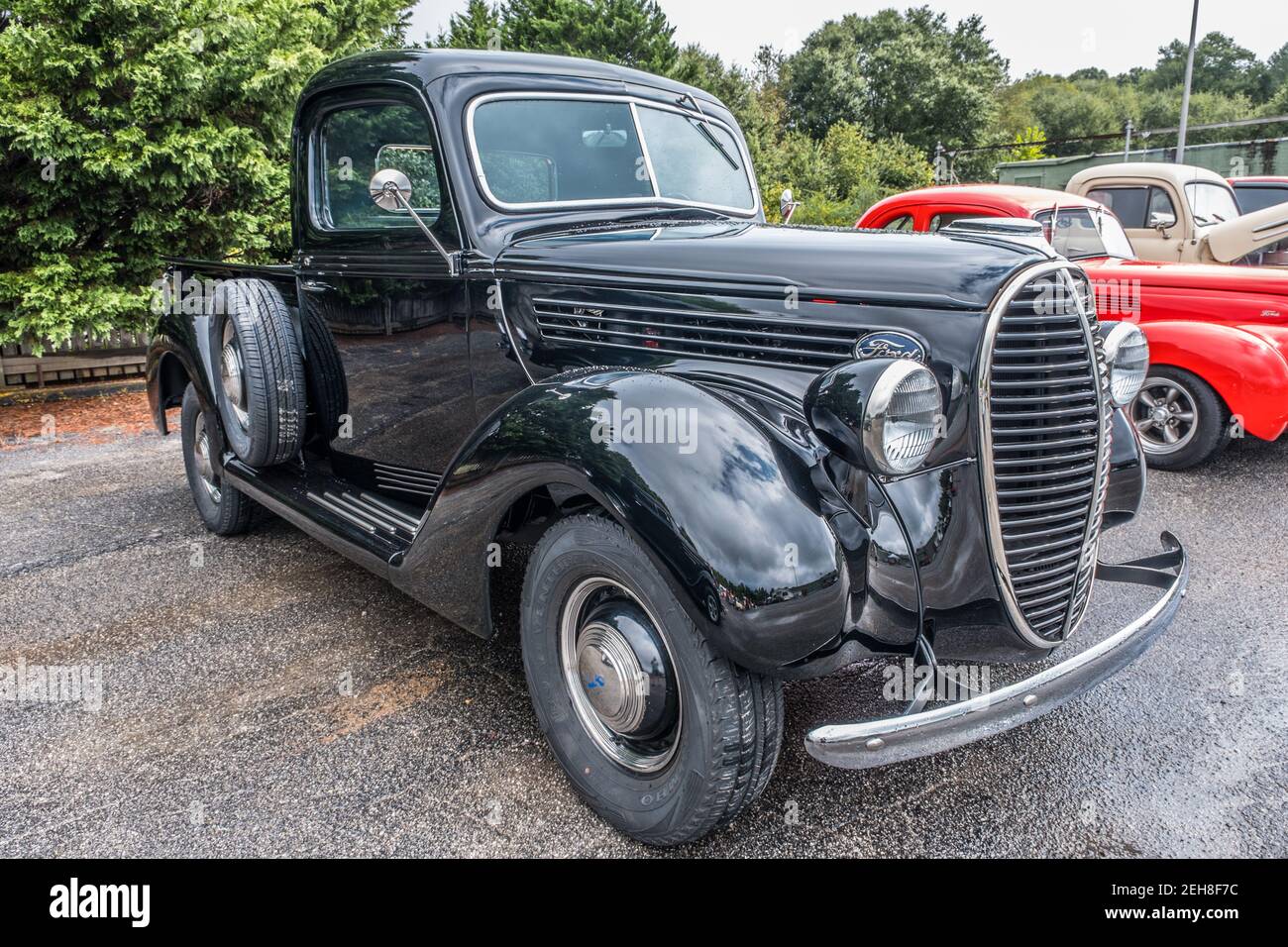 A beautiful restoration on a late model 1930s black Ford truck with ...
