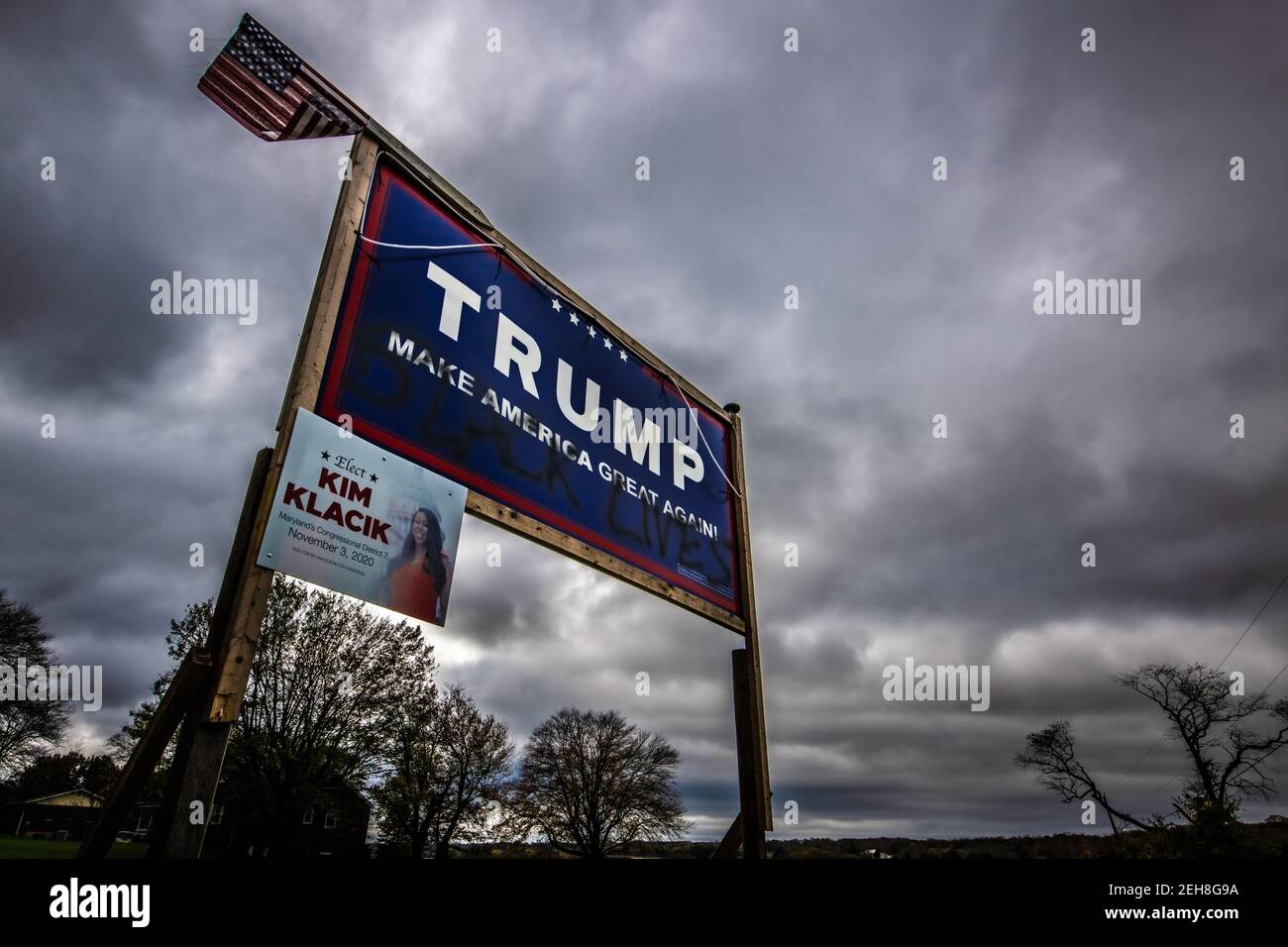 Trump sign with graffiti Stock Photo - Alamy