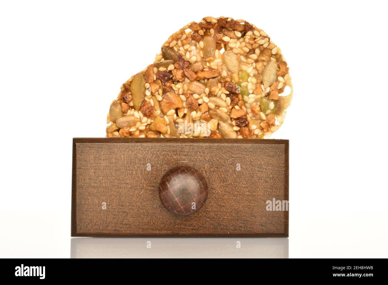 Several fresh fragrant tasty sweet nutty cookies lie in a wooden box ...