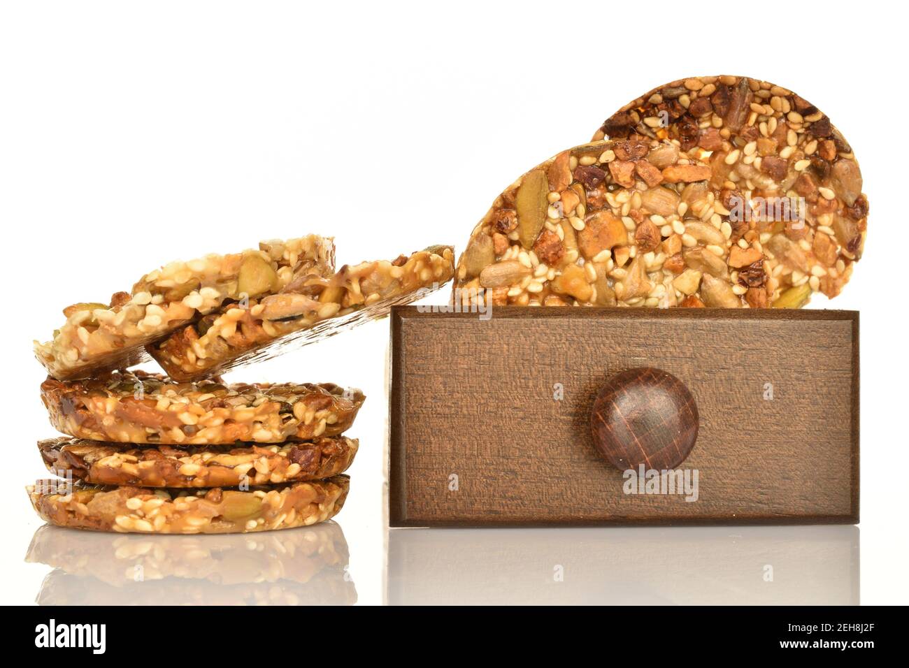 Several fresh fragrant tasty sweet nutty cookies lie in a wooden box ...