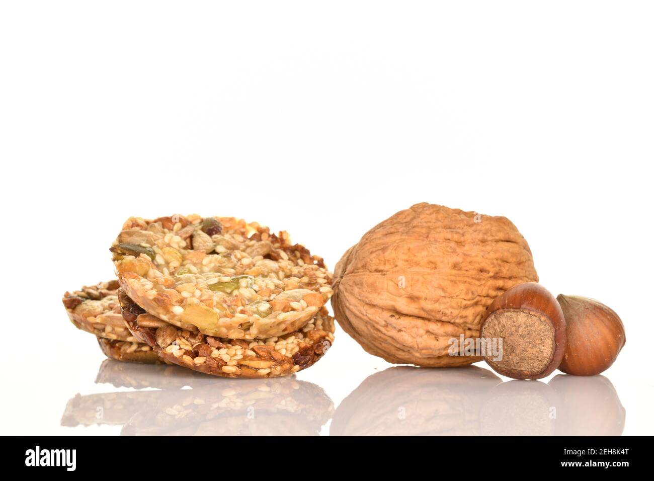 A few fresh fragrant delicious nutty cookies and a few natural nuts on ...