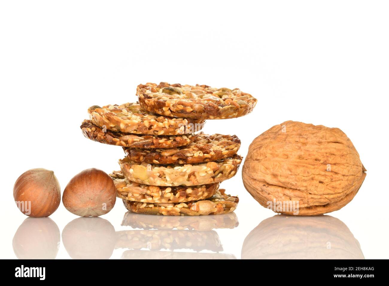 A few fresh fragrant delicious nutty cookies and a few natural nuts on ...