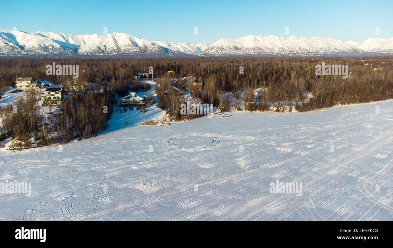 Ice fishing on Long Lake. Palmer, Alaska Stock Photo - Alamy