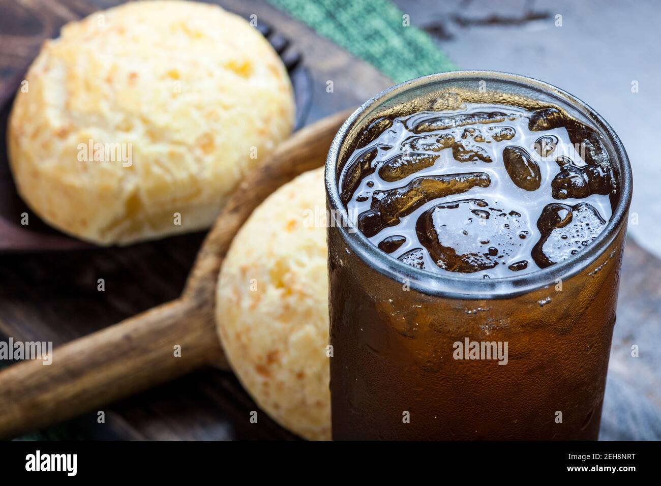 Brazilian snack cheese bread with cola soda Stock Photo - Alamy