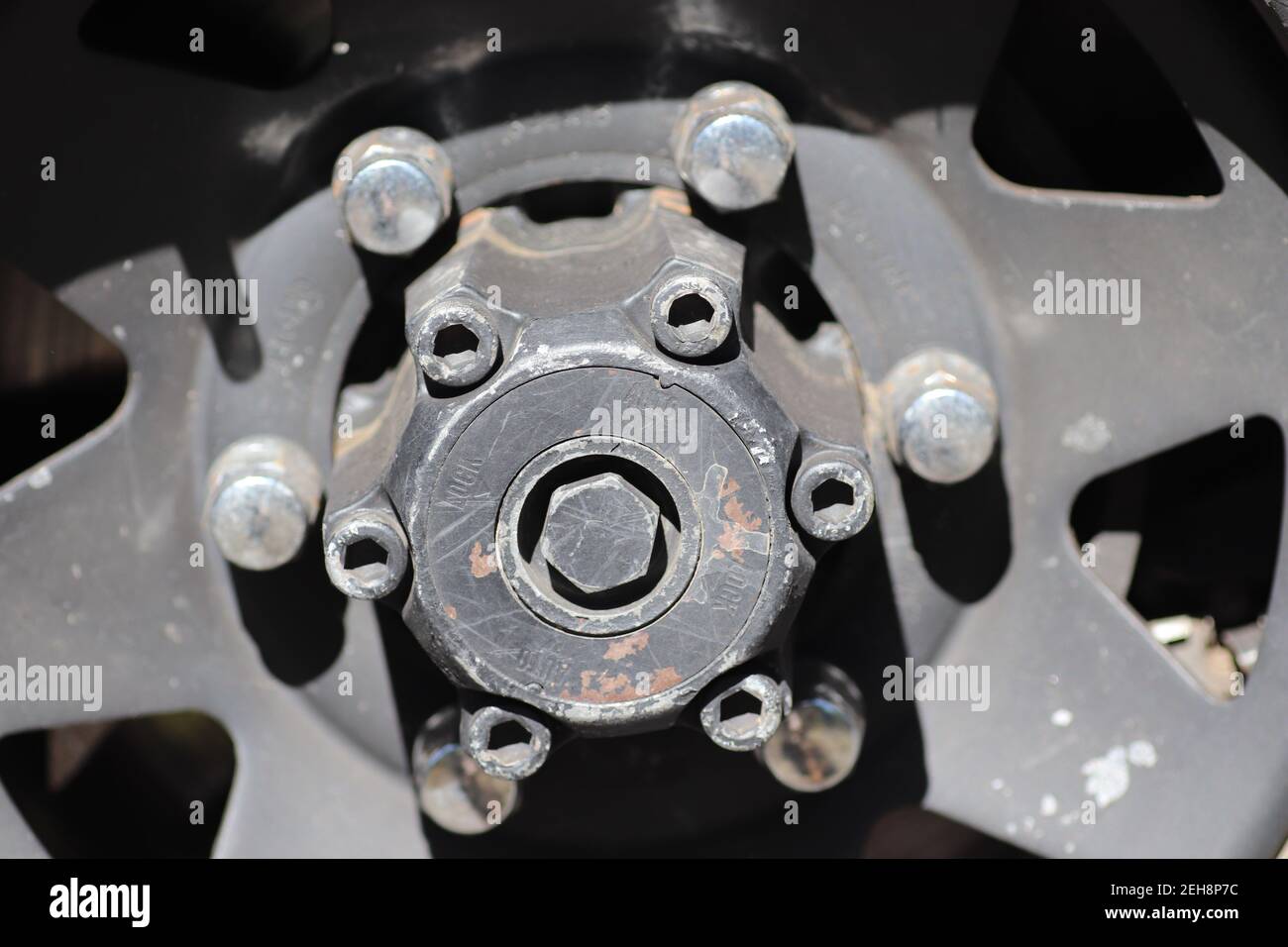 iron car rim with black bolts Stock Photo - Alamy