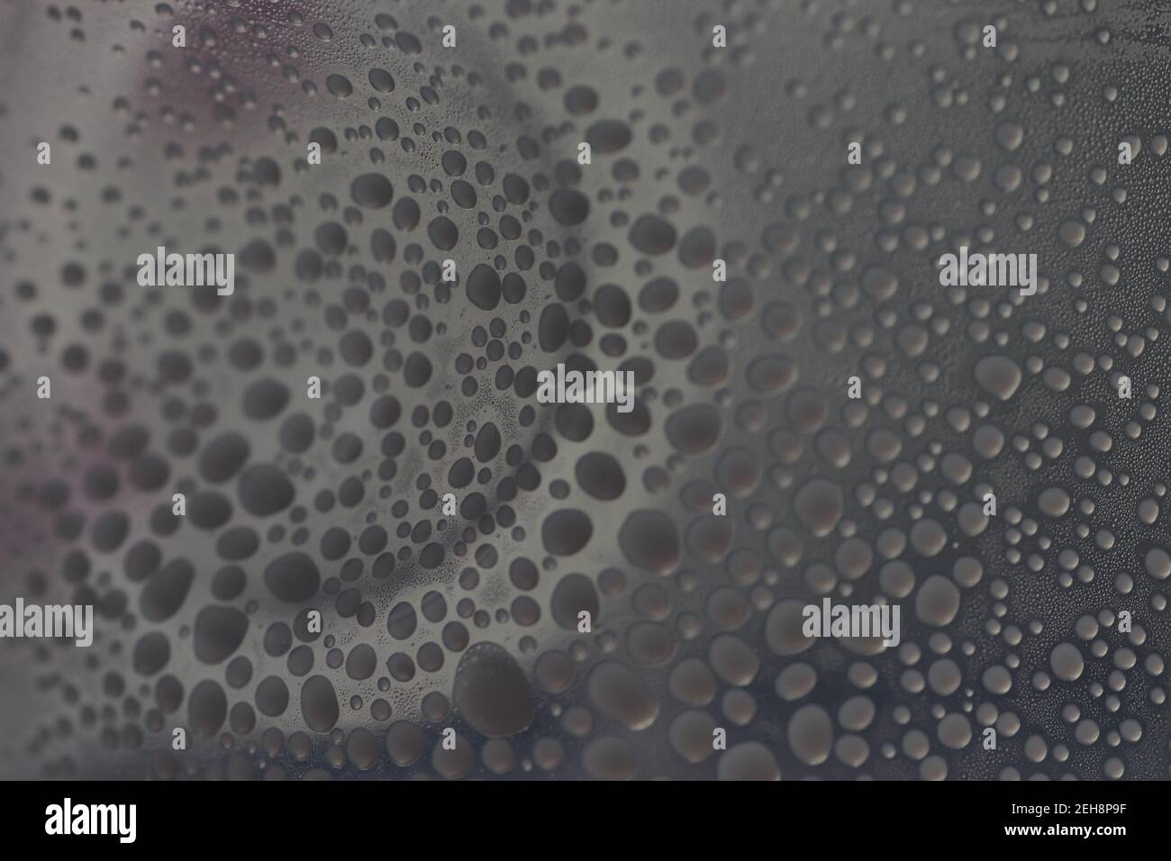 water drops on a transparent plastic surface, macro view of water Stock ...